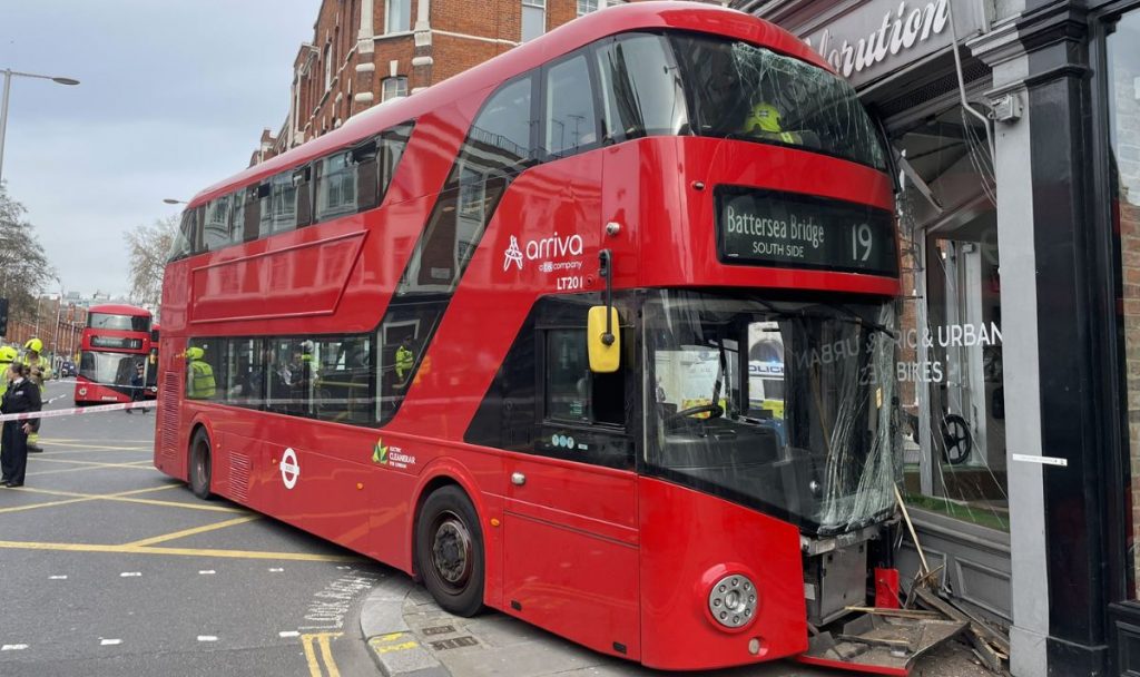 Double-decker crash sees London bus smash into shop as passenger ...