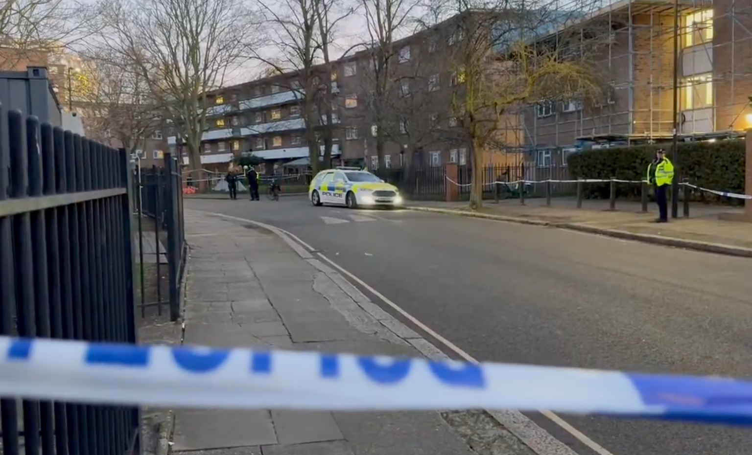 Teenager shot dead in broad daylight pictured as gunman 'remains at ...